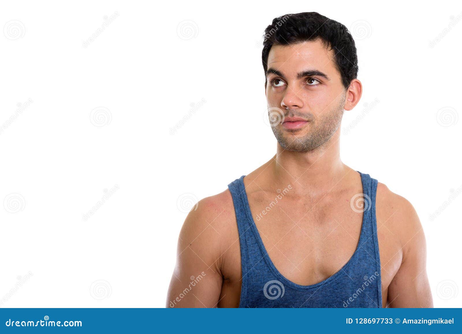Studio Shot of Young Handsome Hispanic Man Thinking while Lookin Stock ...