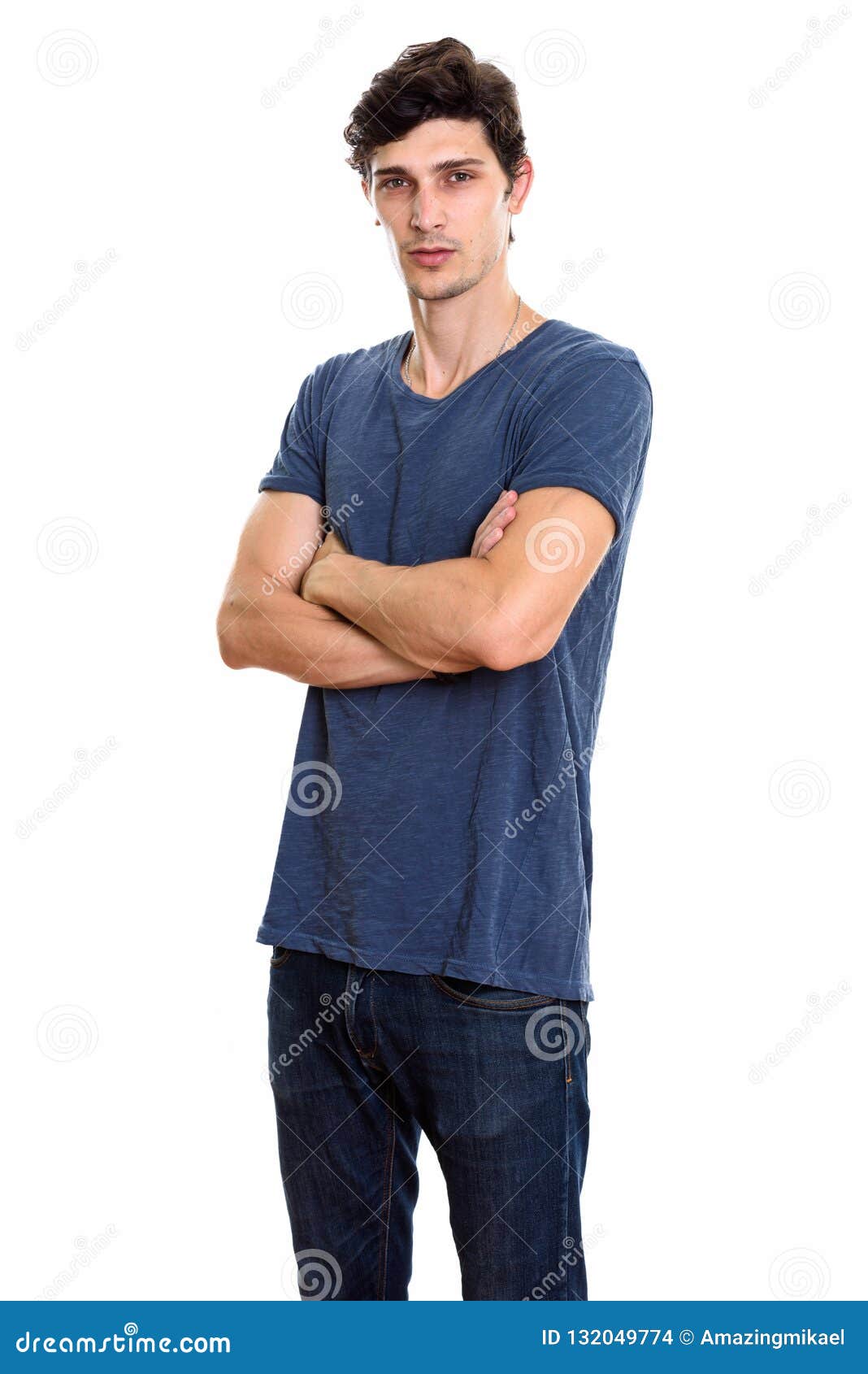 Studio Shot of Young Handsome Man Standing with Arms Crossed Stock ... Studio Shot of Young Handsome Man Standing with Arms Crossed Stock ...