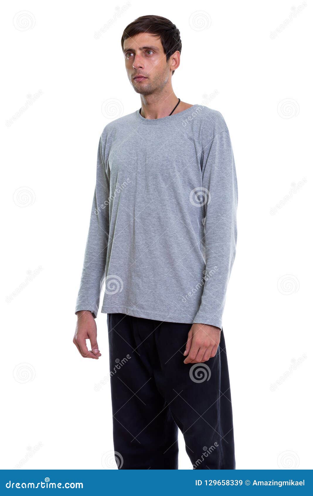 Studio Shot of Young Handsome Man Standing while Thinking and Lo Stock ...