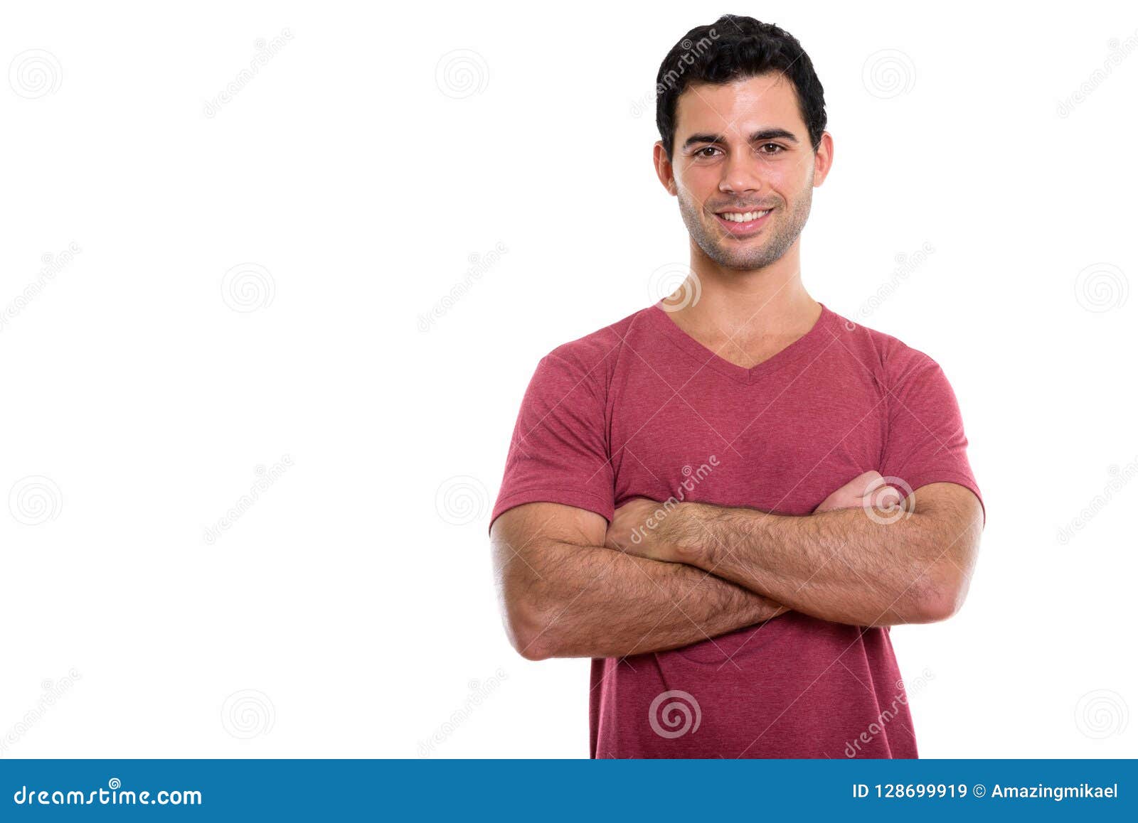 Studio Shot of Young Happy Handsome Hispanic Man Smiling with Ar Stock ... Studio Shot of Young Happy Handsome Hispanic Man Smiling with Ar Stock ...
