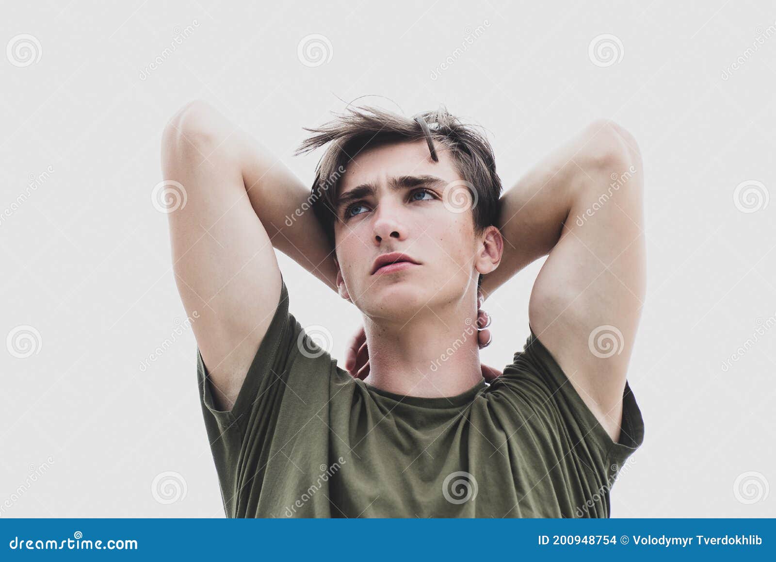Studio Shot of Young Man Looking Up. Handsome Guy with Confident Face ...