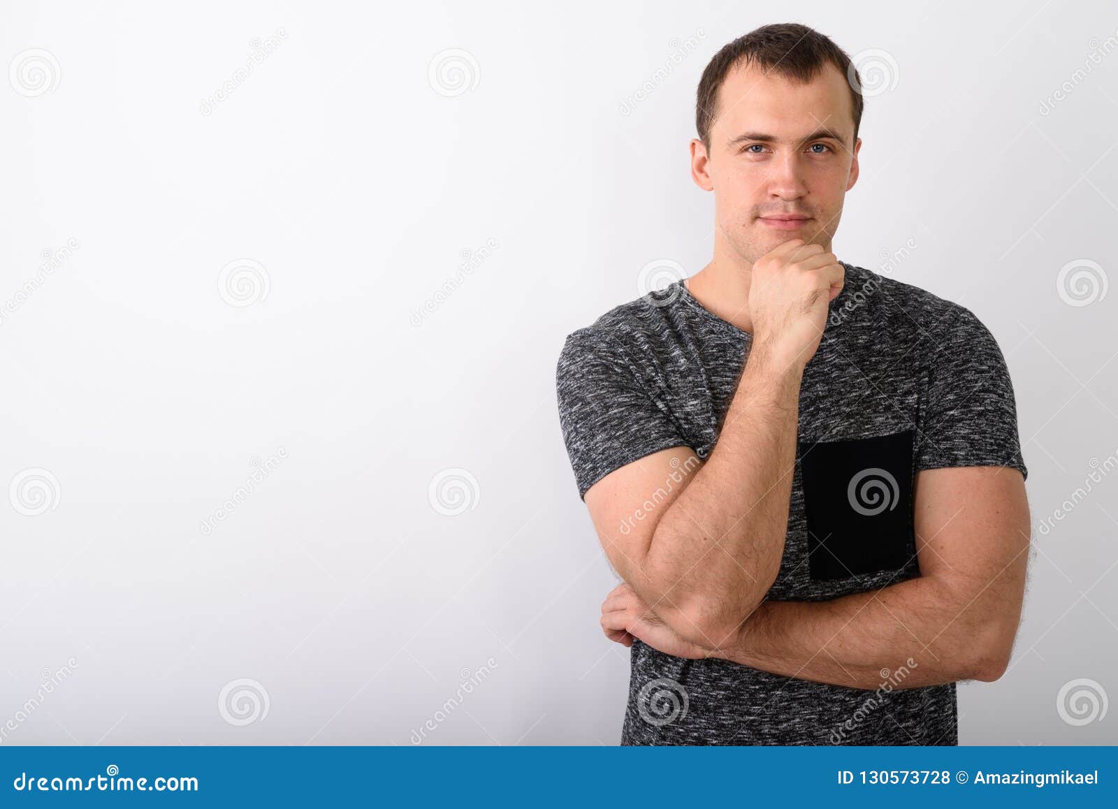 Studio Shot of Young Muscular Man Thinking Against White Backgro Stock ...