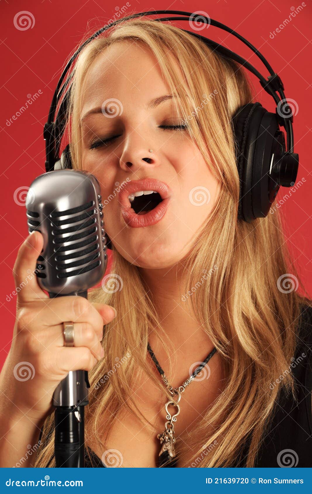 In the Studio Singing into Old Micriophone Stock Photo - Image of blond ...