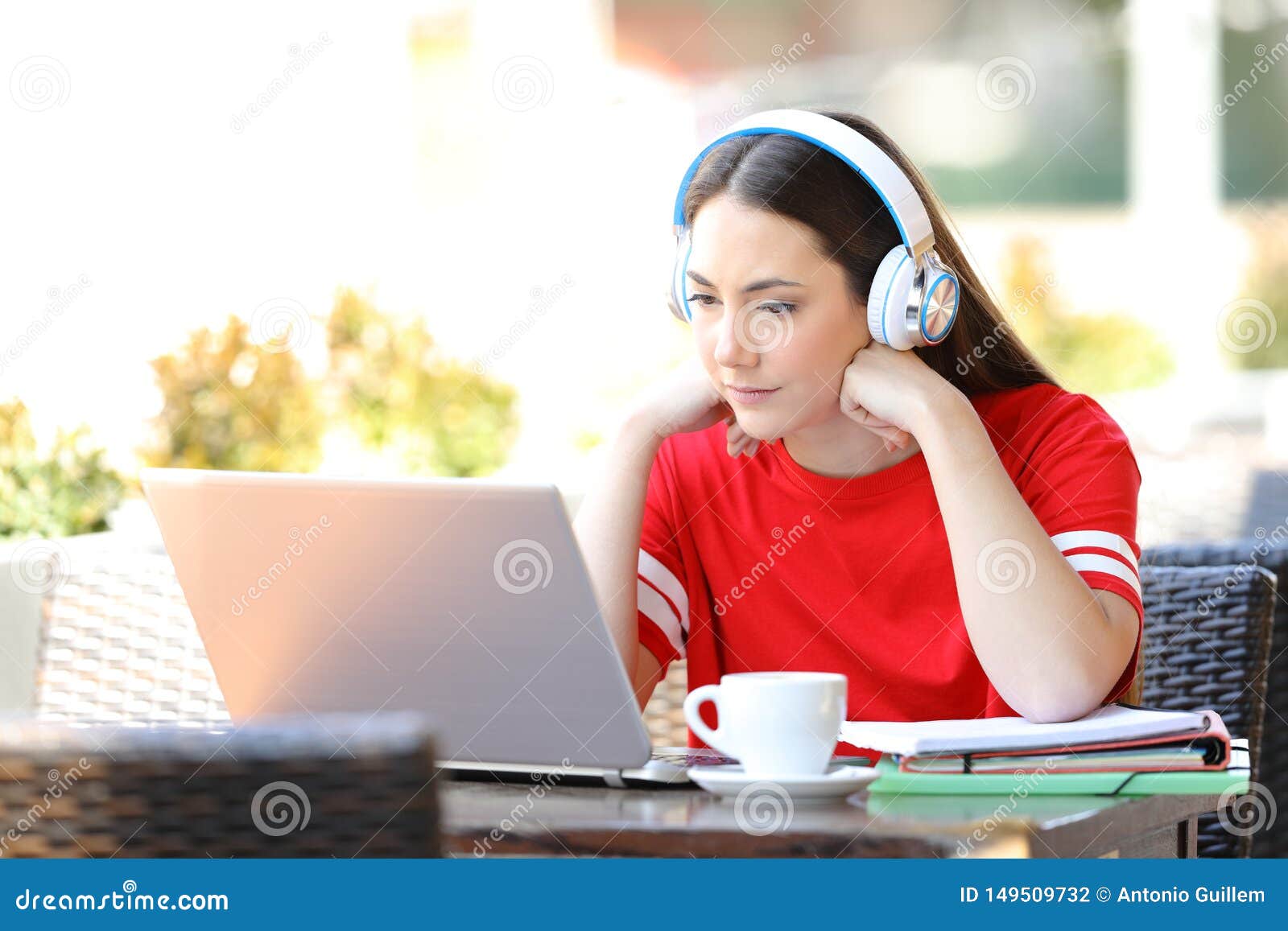 Studious Student E-learning Watching Tutorials on Laptop Stock Photo ...