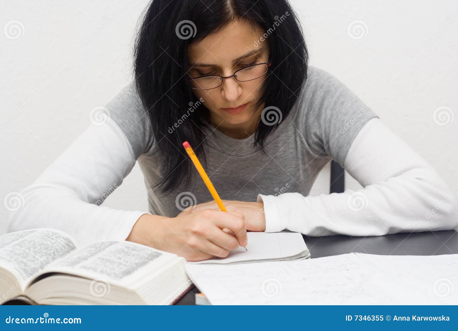 Study stock image. Image of desk, brunette, hand, face - 7346355