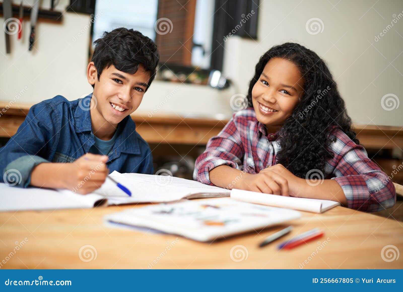 Study Buddies Make Homework Easier. Two Young Students Studying Together in a Classroom. Stock ...