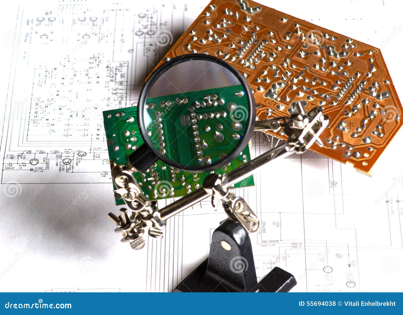 The Study of the Electrical Board with a Magnifying Glass Stock Photo ...