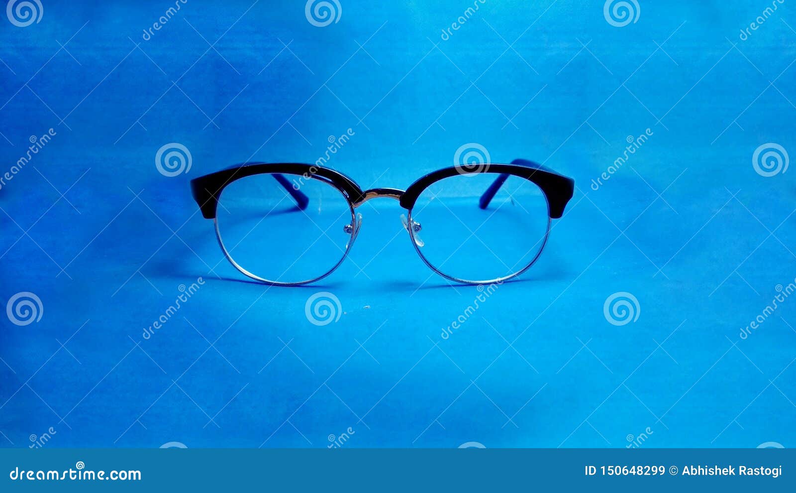 Study Glasses on Blue Background Stock Image - Image of modern, design ...