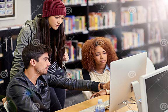 Study Group with a Plan. a Group of Students Working Together at a ...