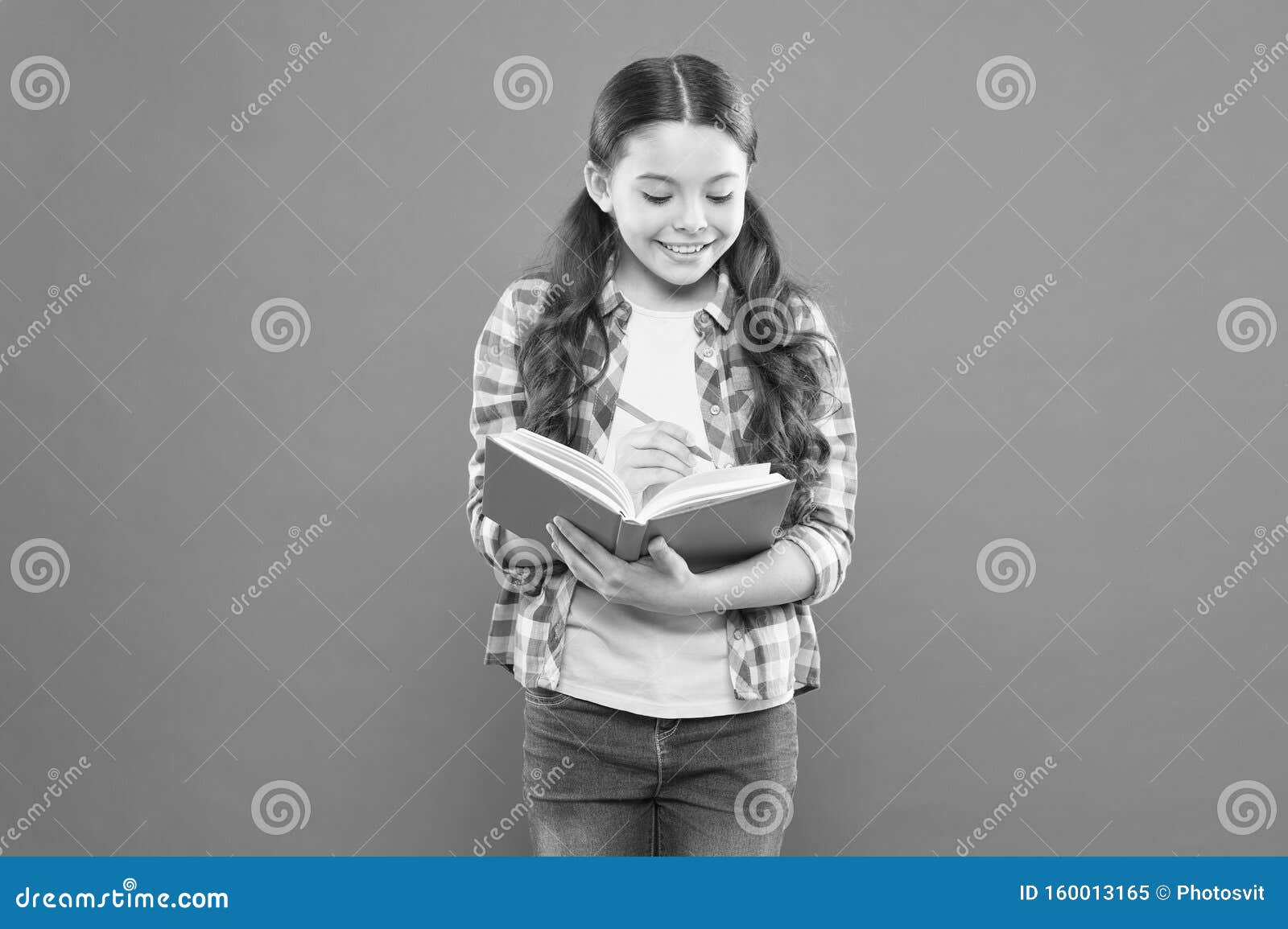 Study Language. Making Notes. Child Doing Homework Writing in Workbook ...