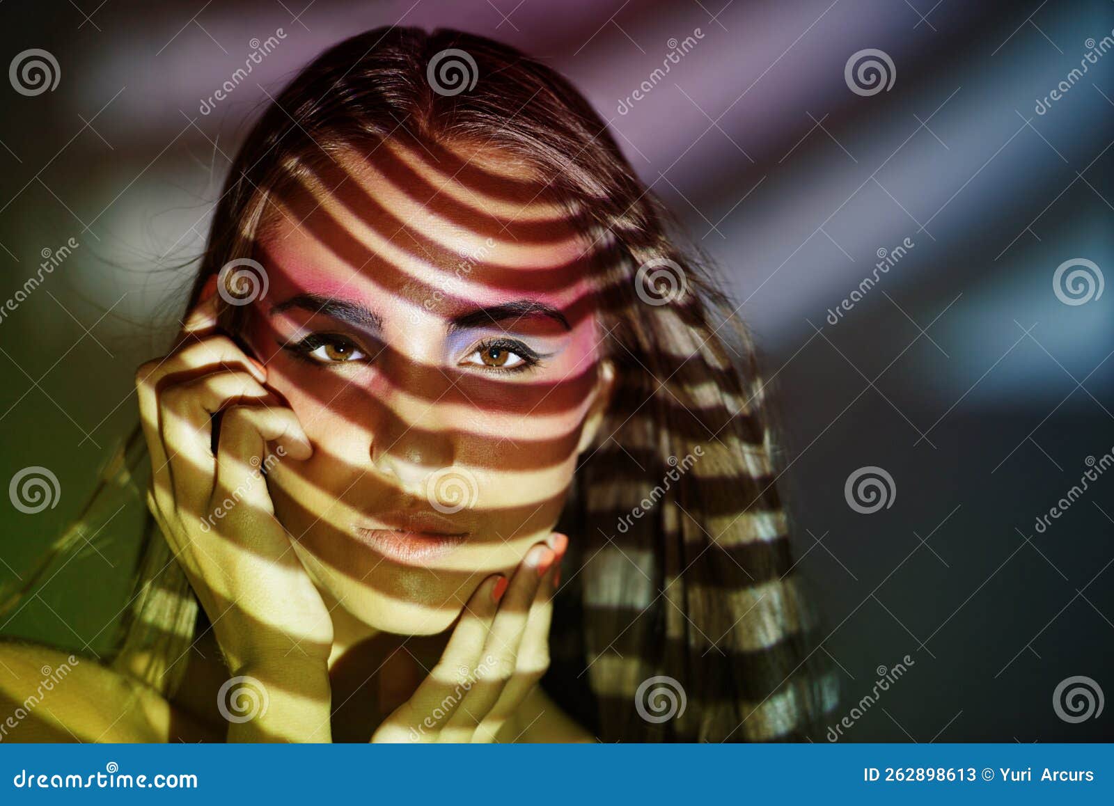 Study of Light,shadow and Beauty. Studio Shot of a Young Woman with ...