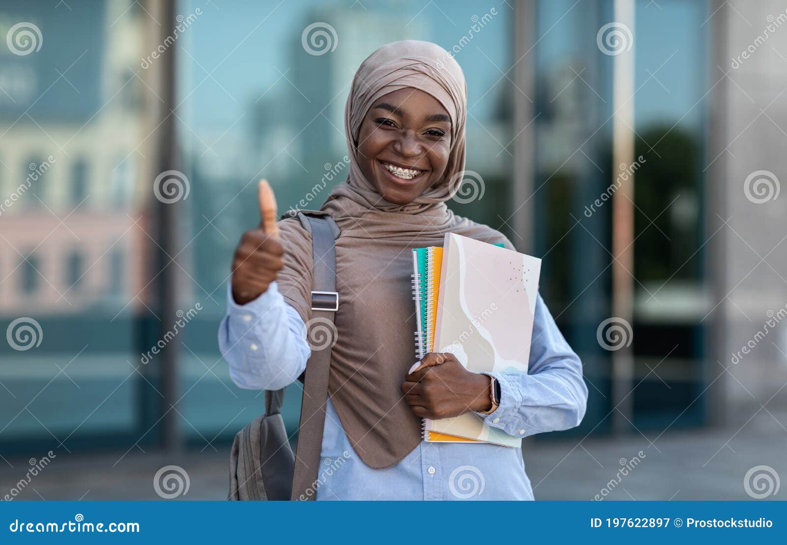 Black Muslim Woman Praying To Allah At Sunset. Solat Traditional ...