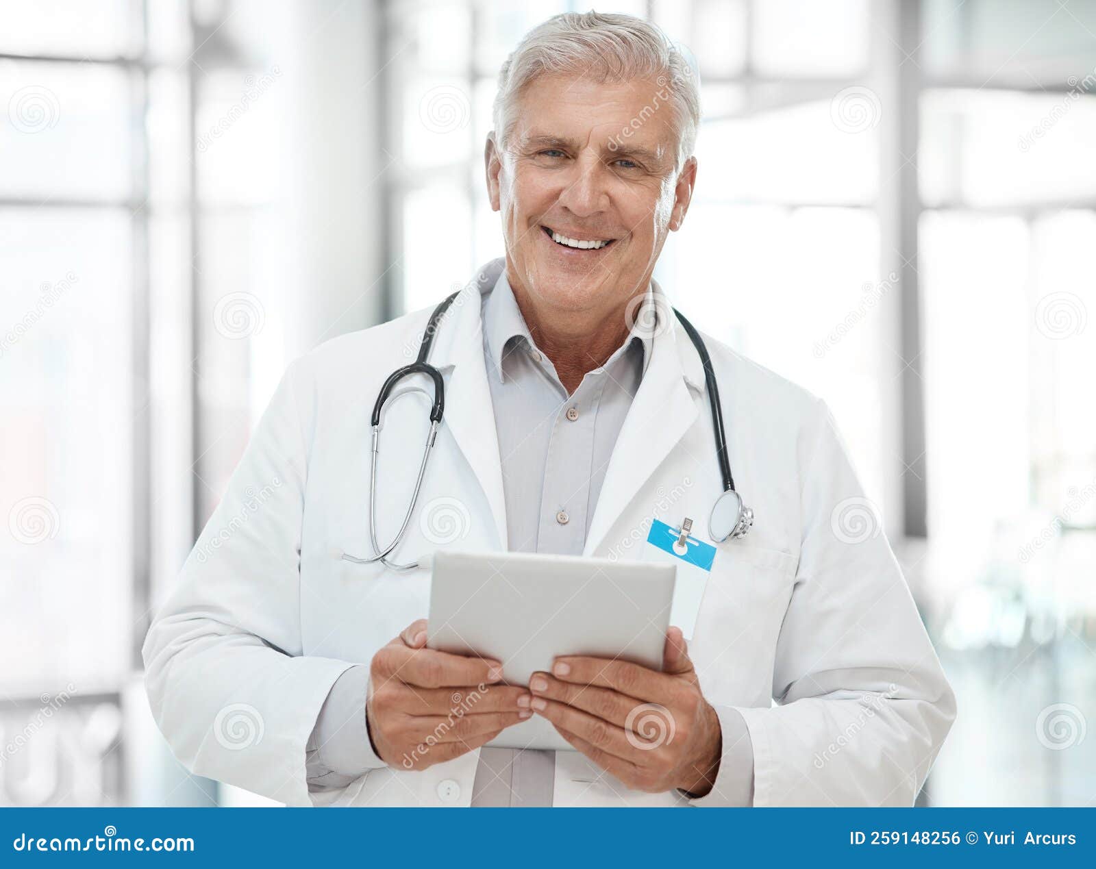 Study To Save Lives. a Doctor Using a Tablet in a Hospital. Stock Photo ...
