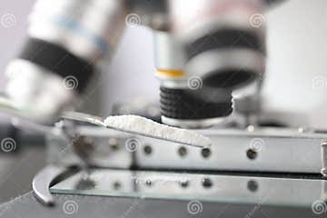 Study of White Powder in a Laboratory Under Microscope Closeup Stock ...