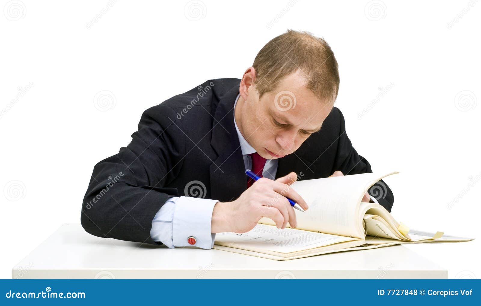 Studying businessman stock photo. Image of pages, suit - 7727848