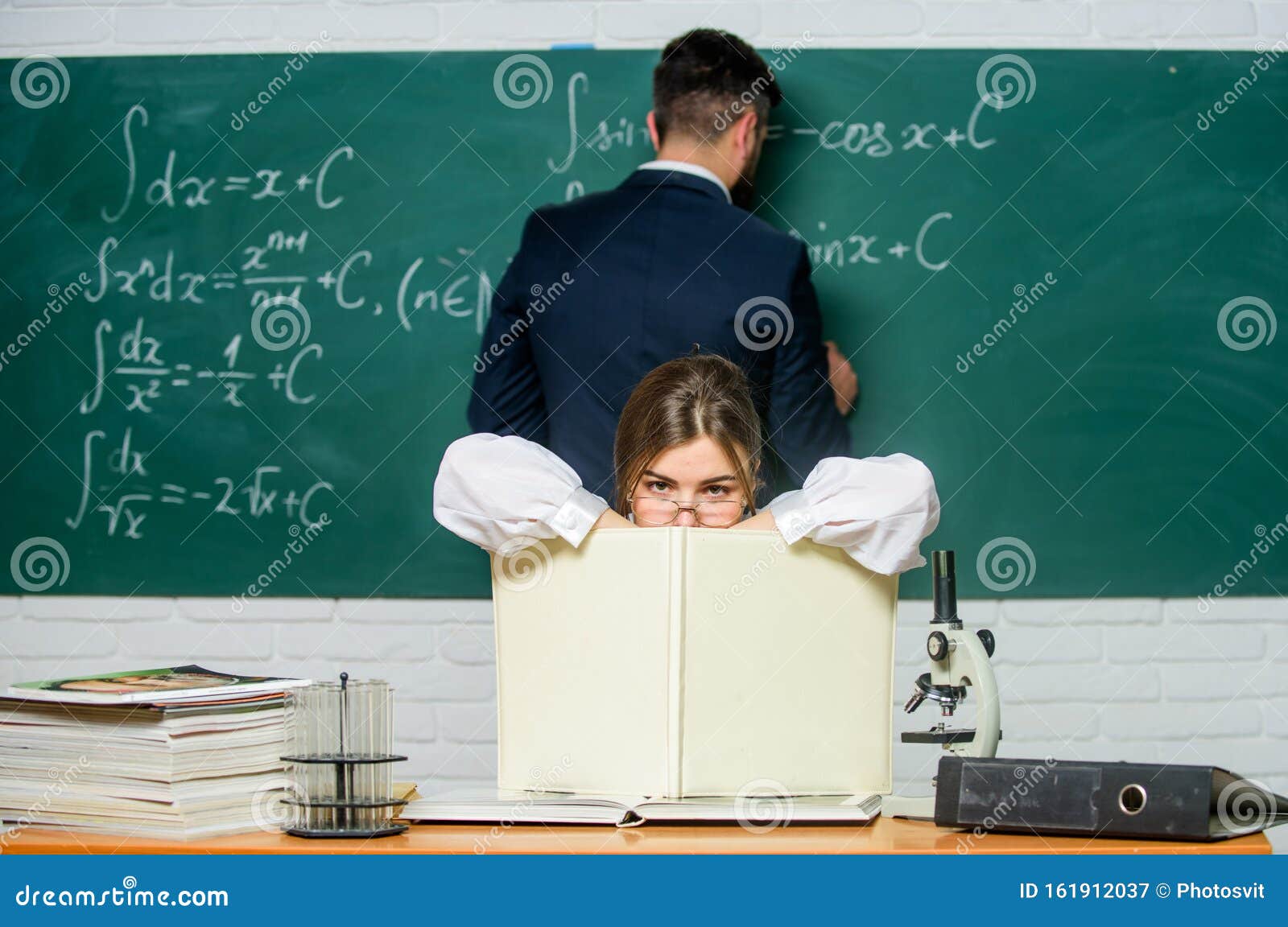 Studying in Class As Usual. Pretty Class Master Conducting Lesson in ...