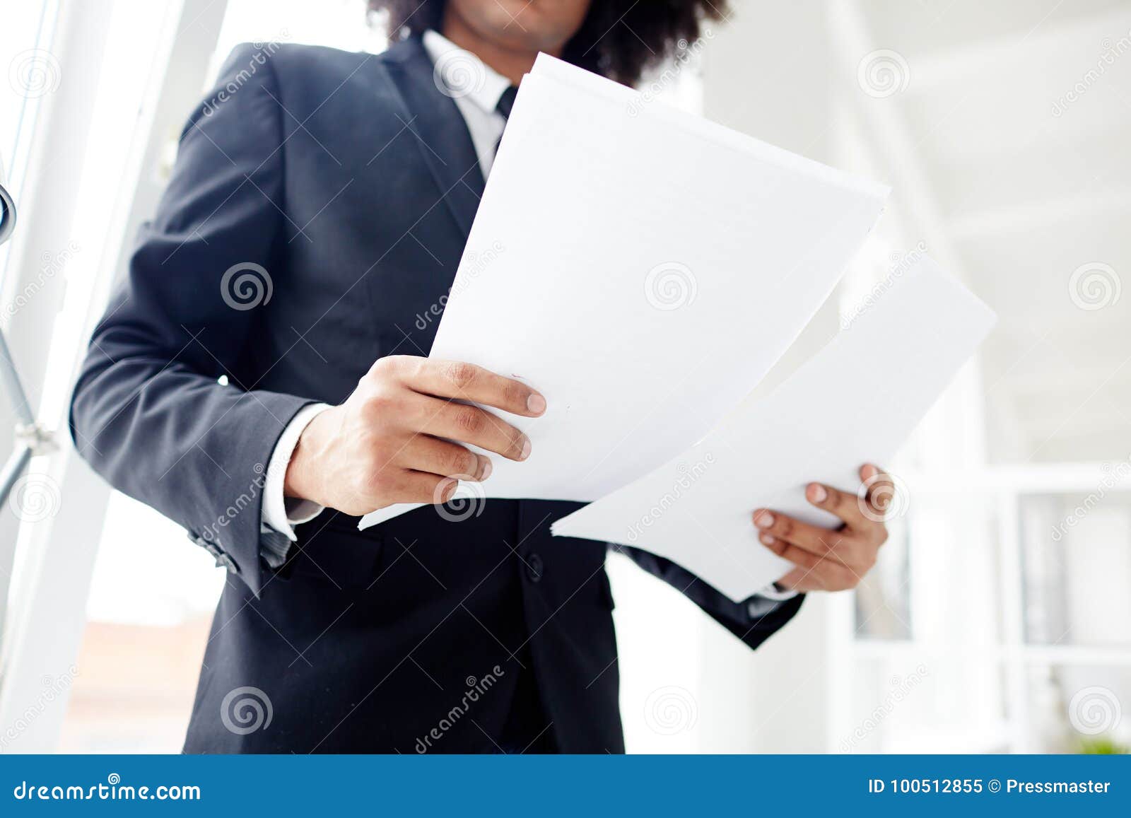 Studying Documents at Modern Office Stock Image - Image of professional ...
