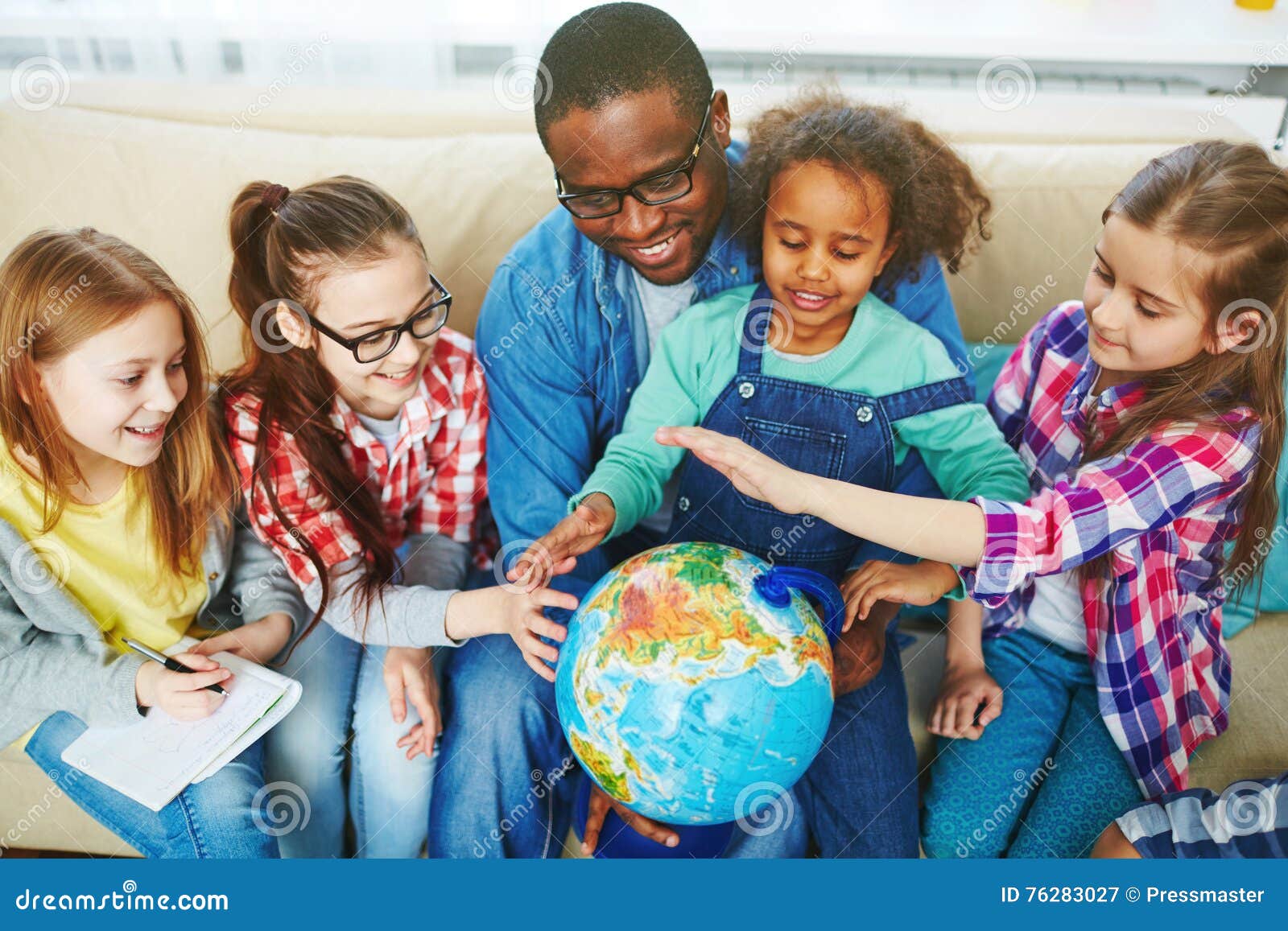 Studying the Earth stock image. Image of globe, learning - 76283027