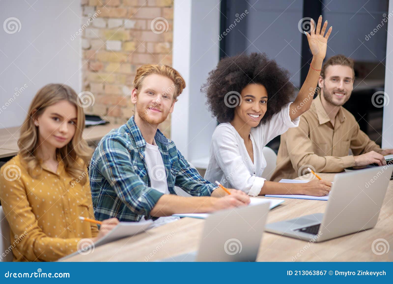 Group of Students Having a Class and Looking Contented Stock Image ...