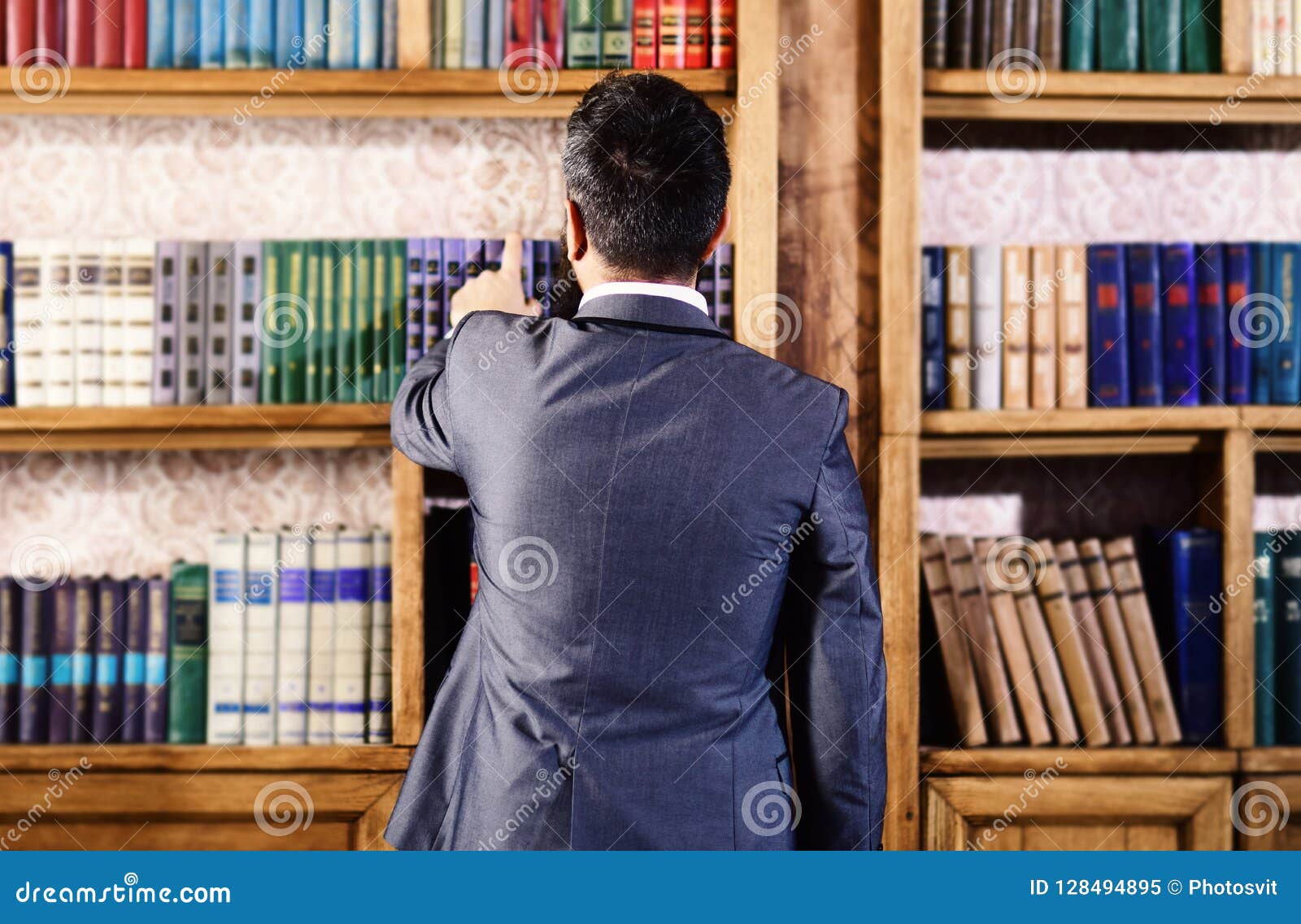Studying and Library Concept. Man Taking Book for Studying Stock Image ...