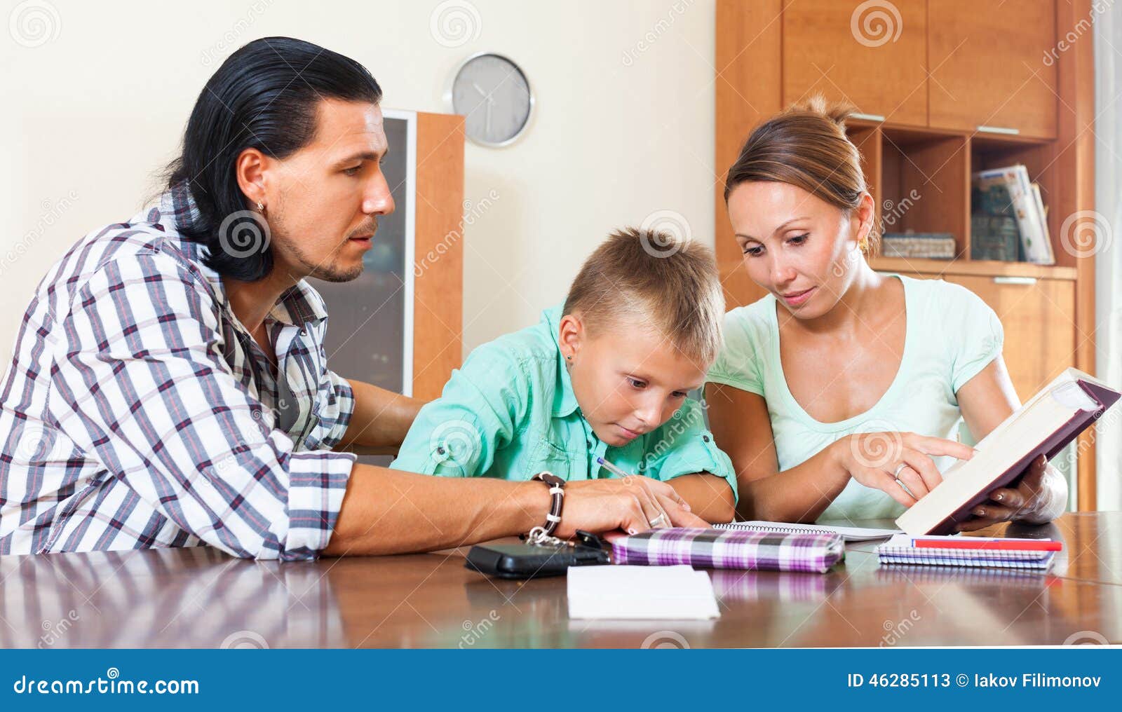 Studying with parents stock image. Image of couple, schoolboy - 46285113