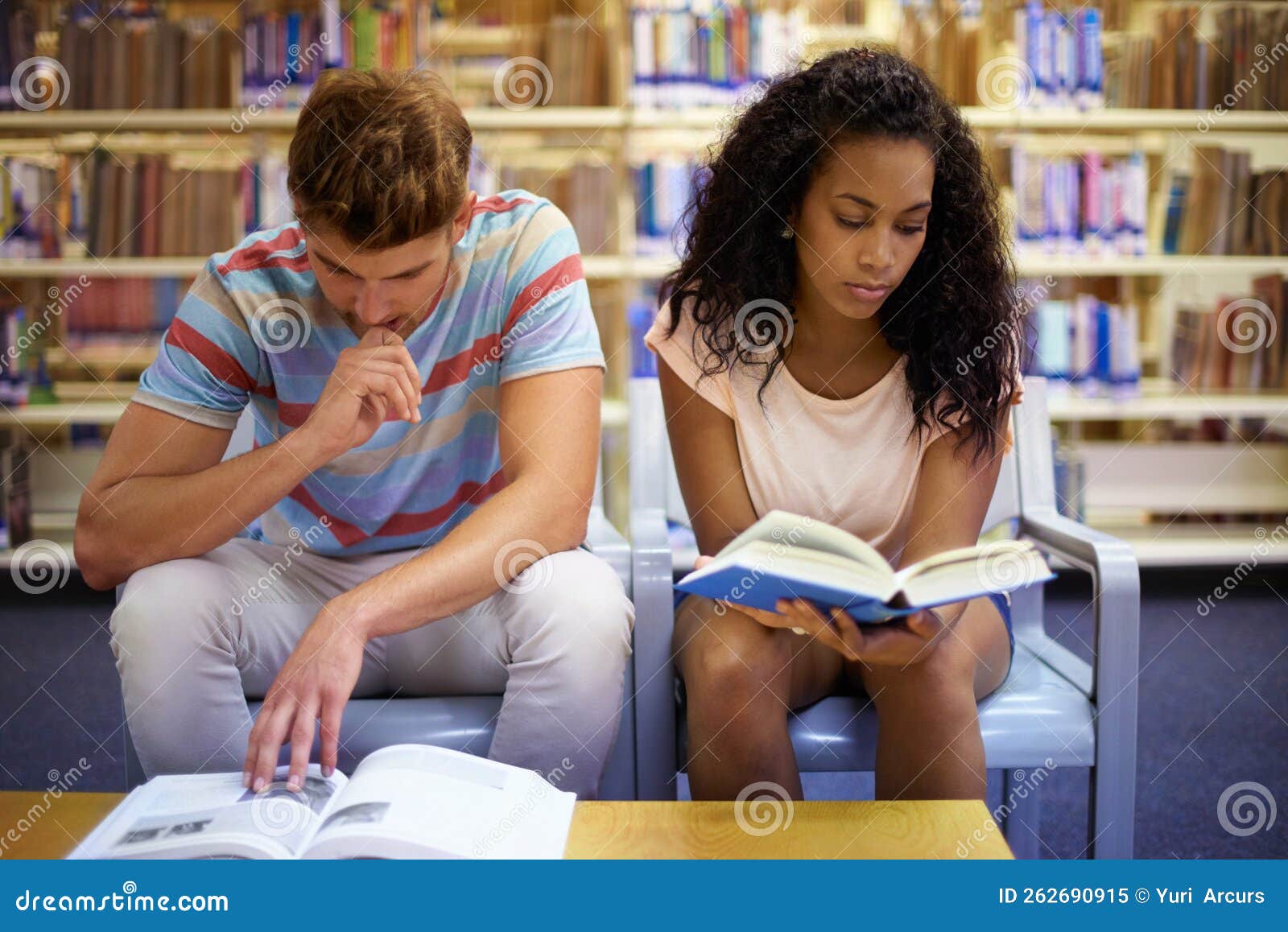 Studying with a Partner is always Helpful. a Two Young Students ...