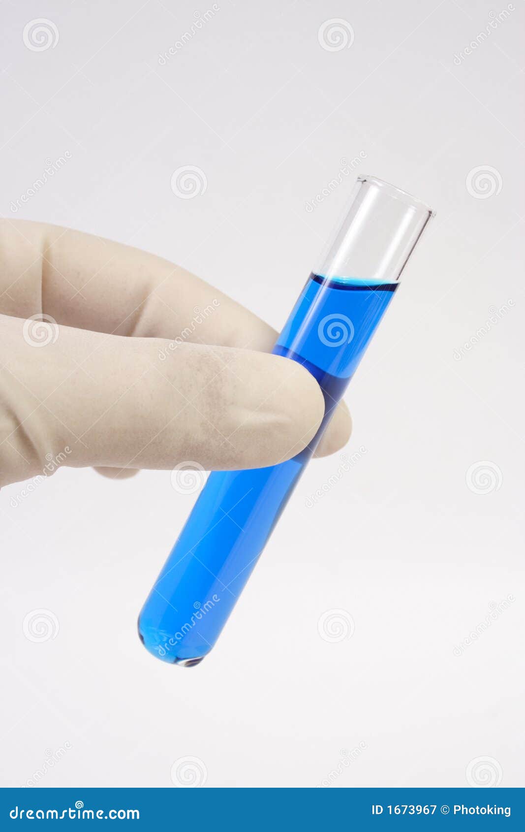 STUDYING a TEST TUBE stock image. Image of stare, diagnostic - 1673967