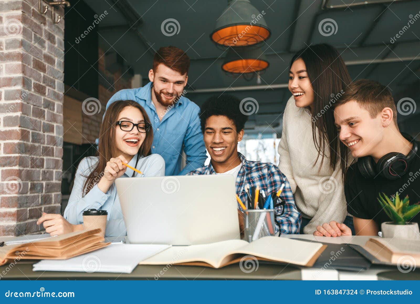 Studying Together. College Students Preparing for Classes in Library ...