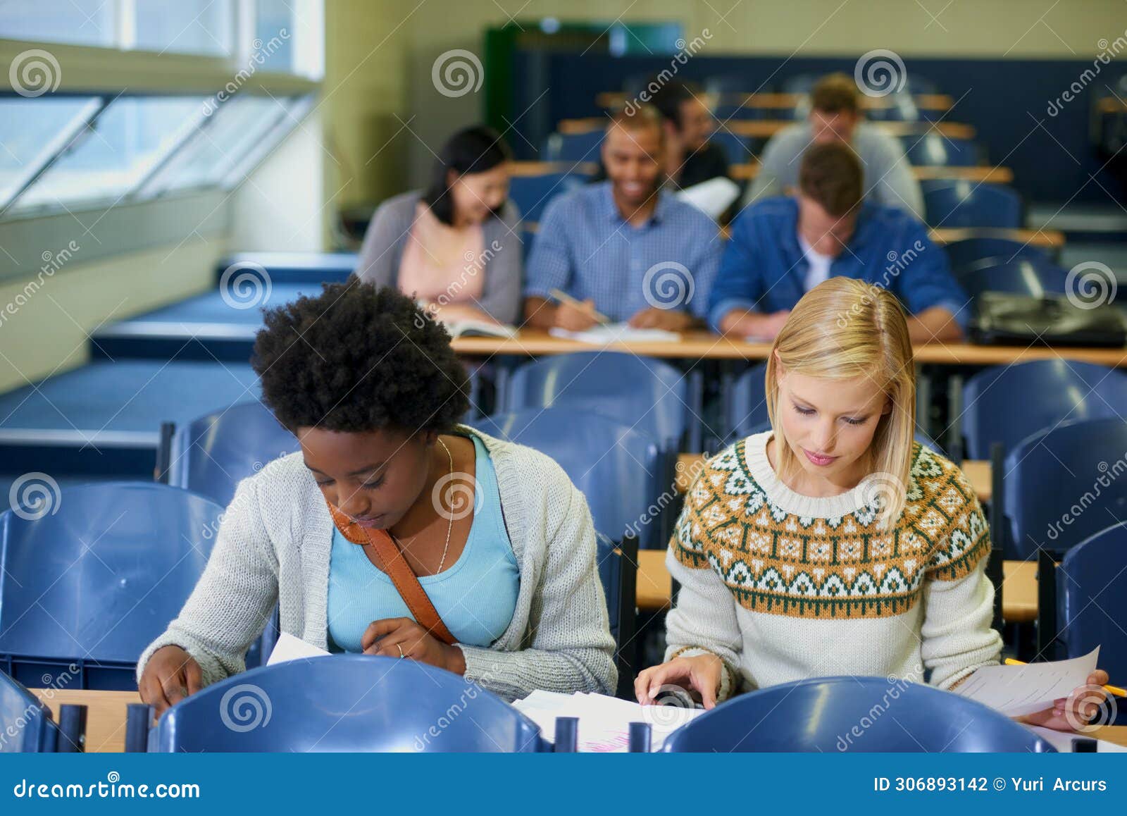 Studying, University and Women Students in Classroom with Textbooks and ...