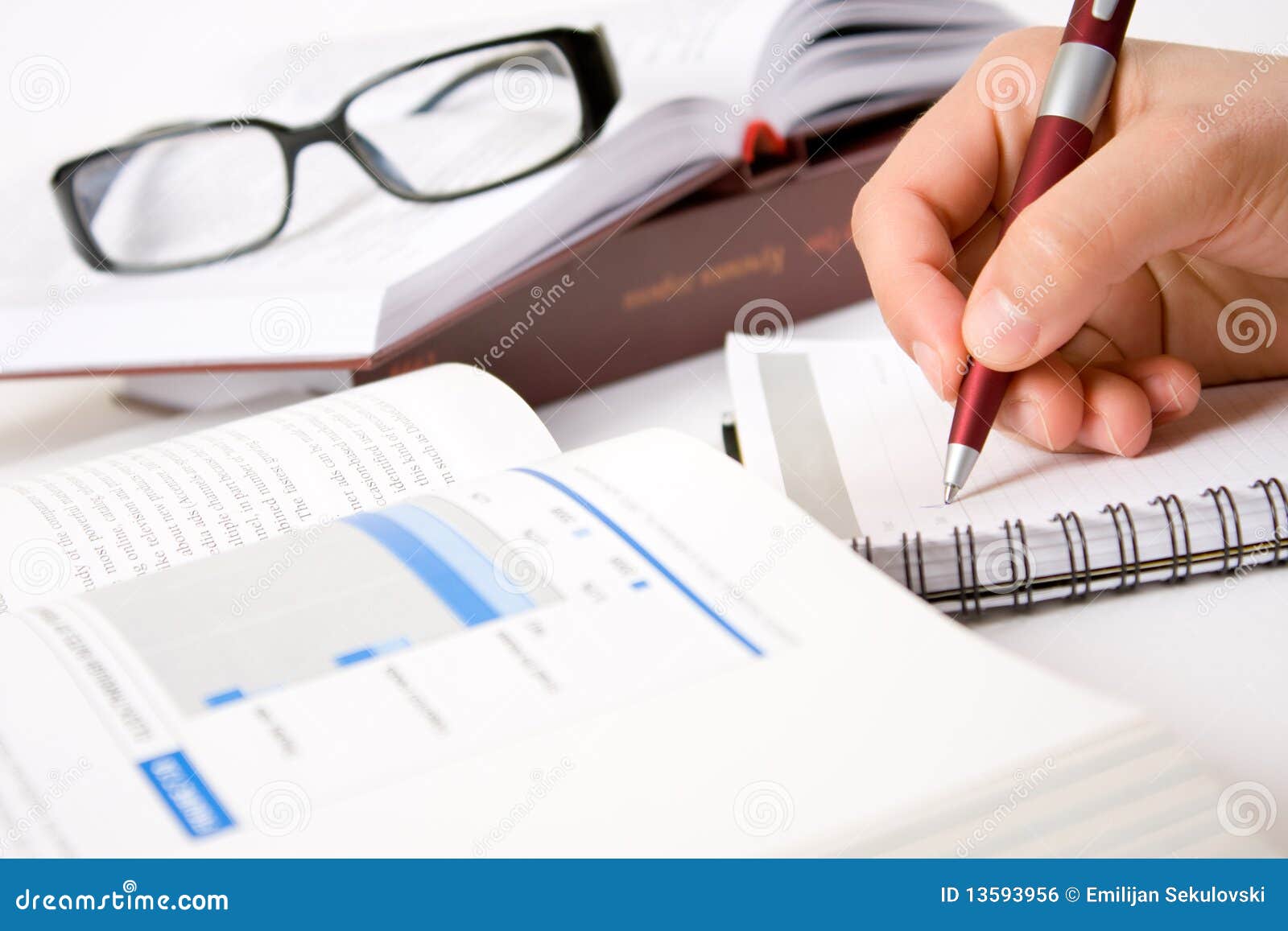 Studying and writing notes stock photo. Image of book - 13593956