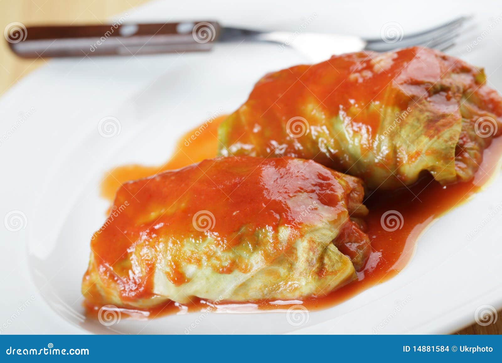 Stuffed Cabbage Leaves With Minced Meat And Rice In Tomato Sauce ...