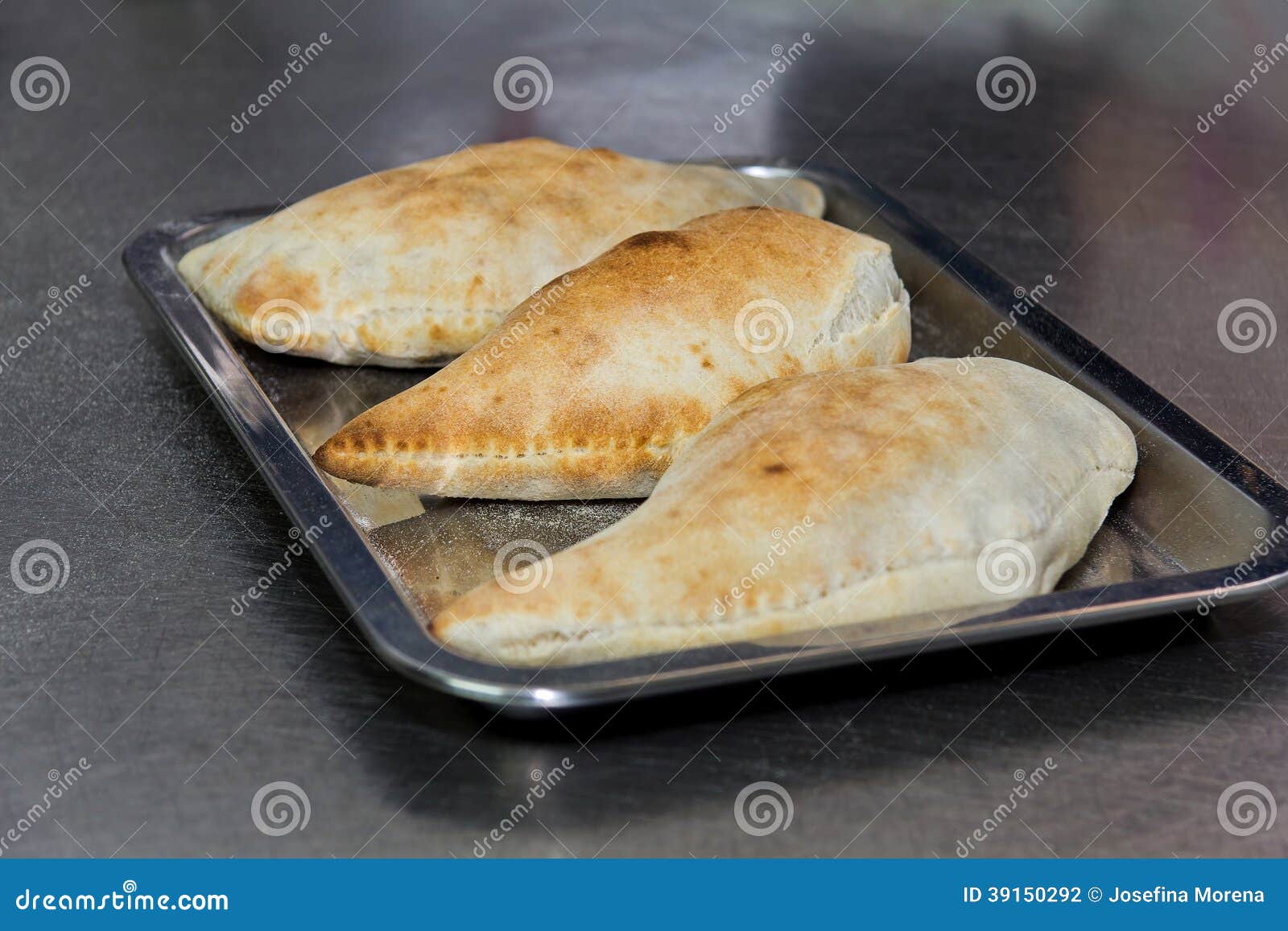Stuffed calzone stock photo. Image of chef, eating, calzones - 39150292