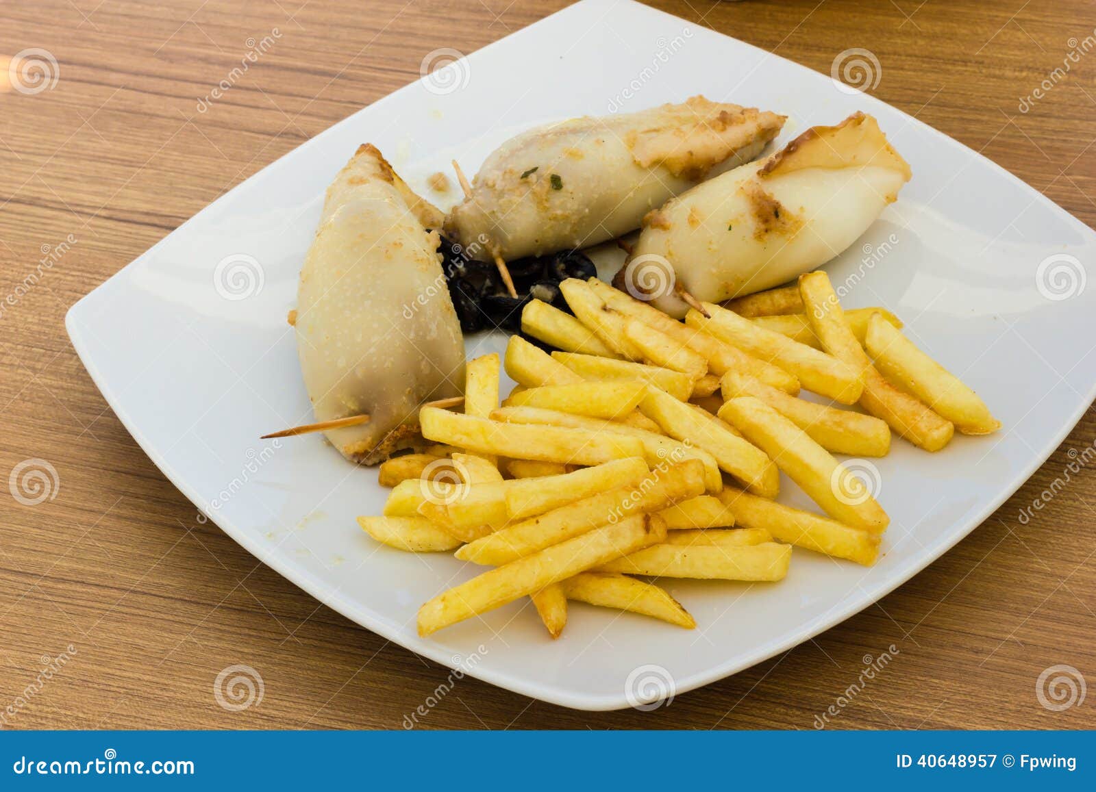 Stuffed Cuttlefish and Chips Stock Image - Image of scene, baby: 40648957
