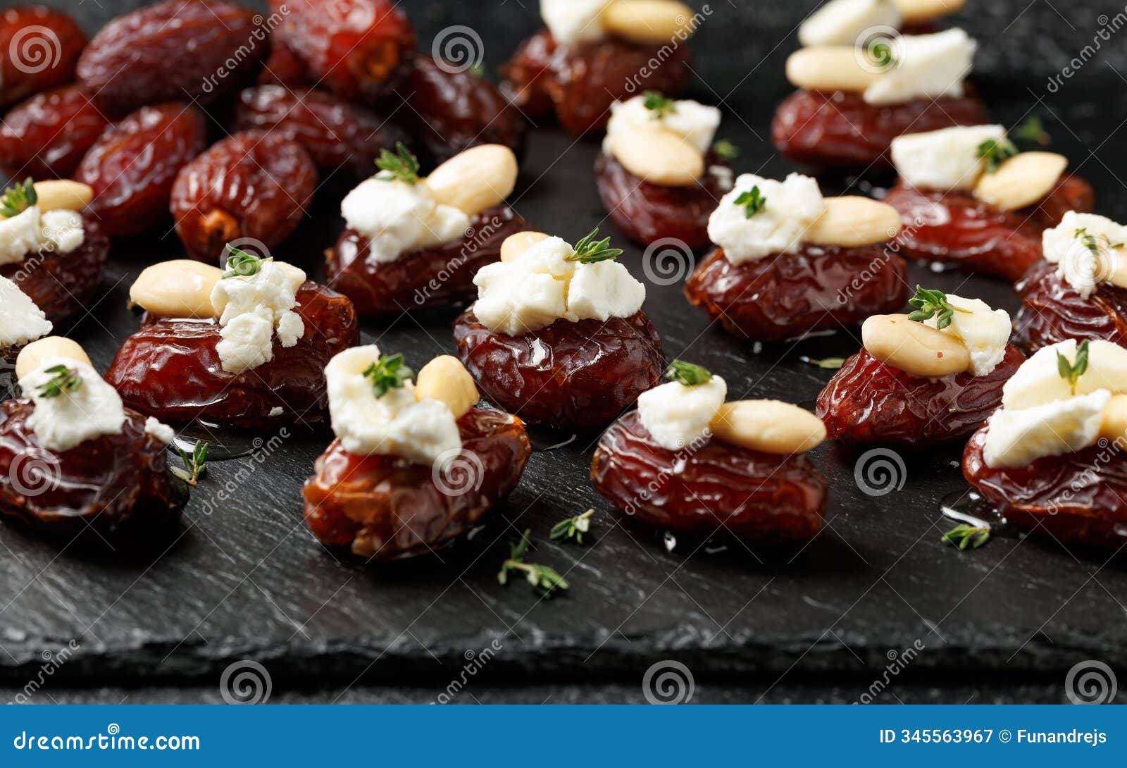 Stuffed Medjool Dates with Goat Cheese, Almonds and Honey Stock Image ...