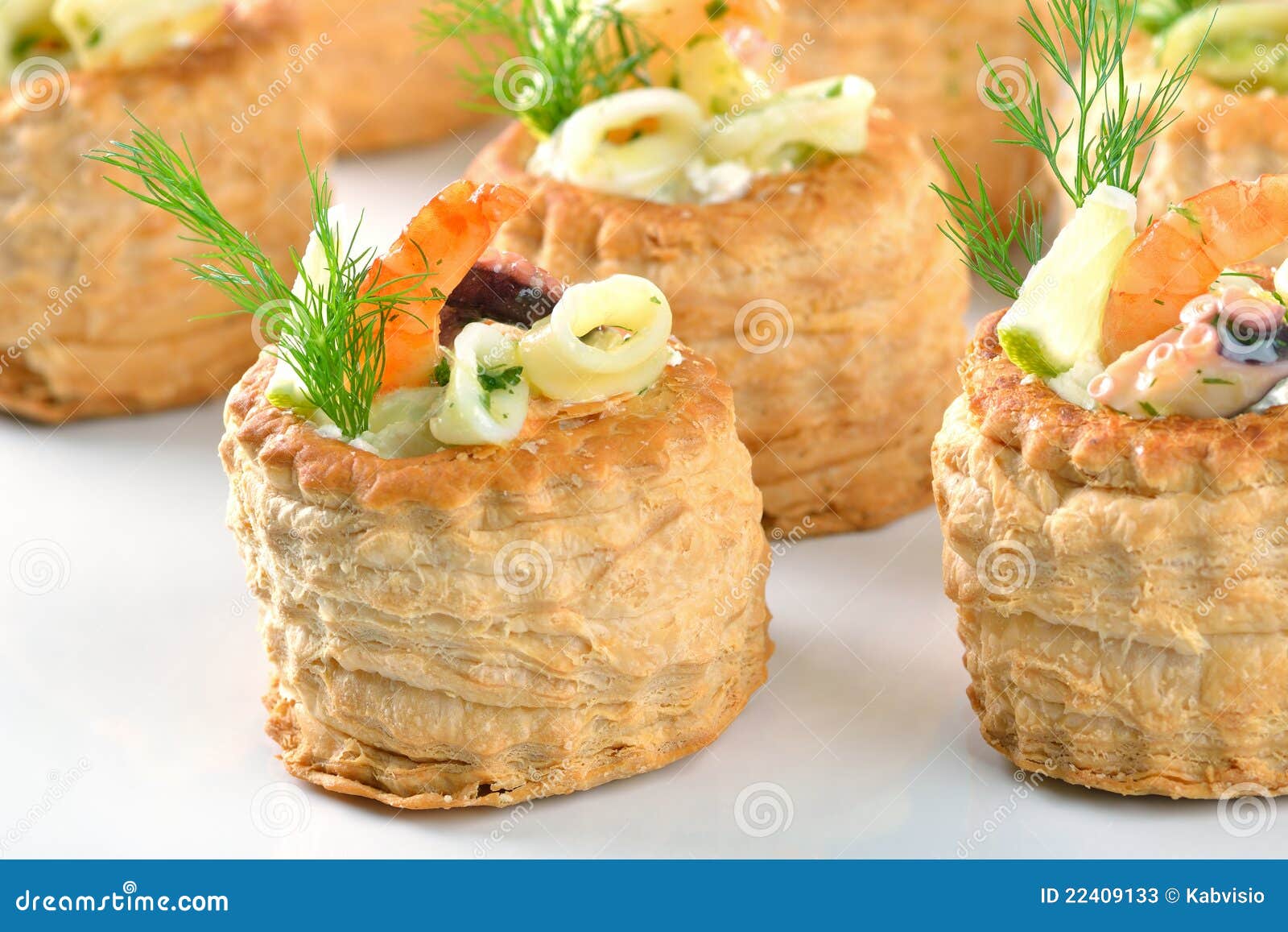 Stuffed puff pastry shells stock image. Image of finger - 22409133