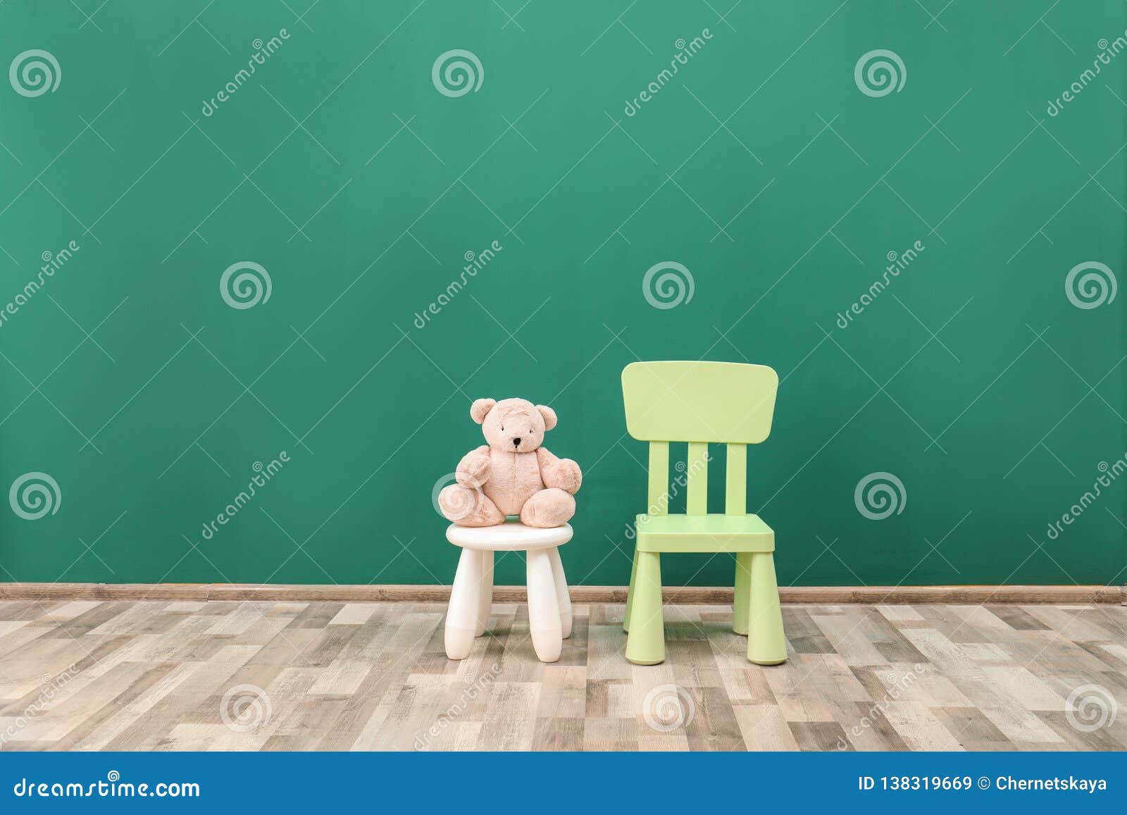 Stuffed Toy Bear on Stool and Chair in Child Room. Stock Image - Image ...