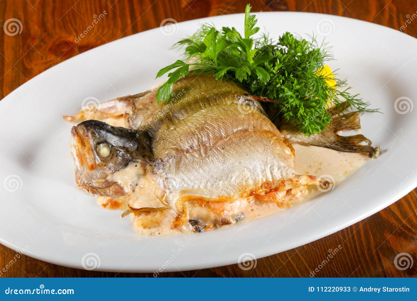 Stuffed trout stock image. Image of herbs, green, sauce - 112220933
