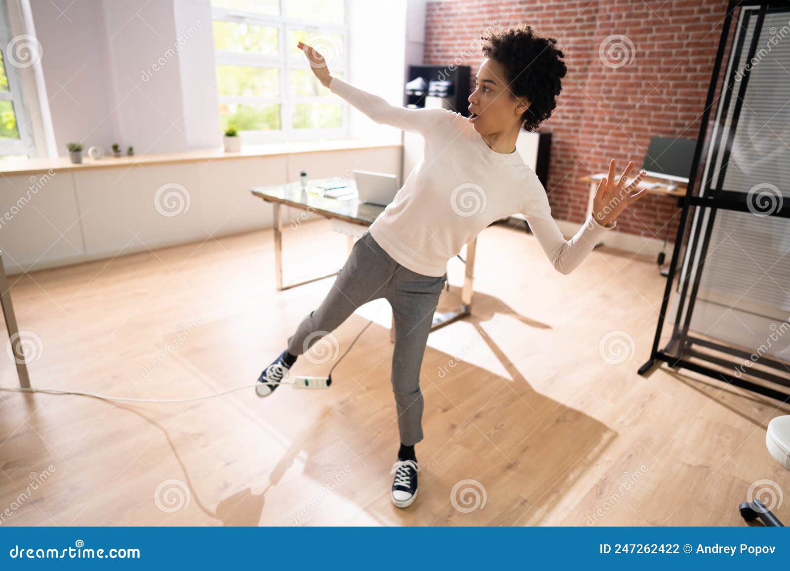 Stumble and Fall Over Wire stock photo. Image of office - 247262422