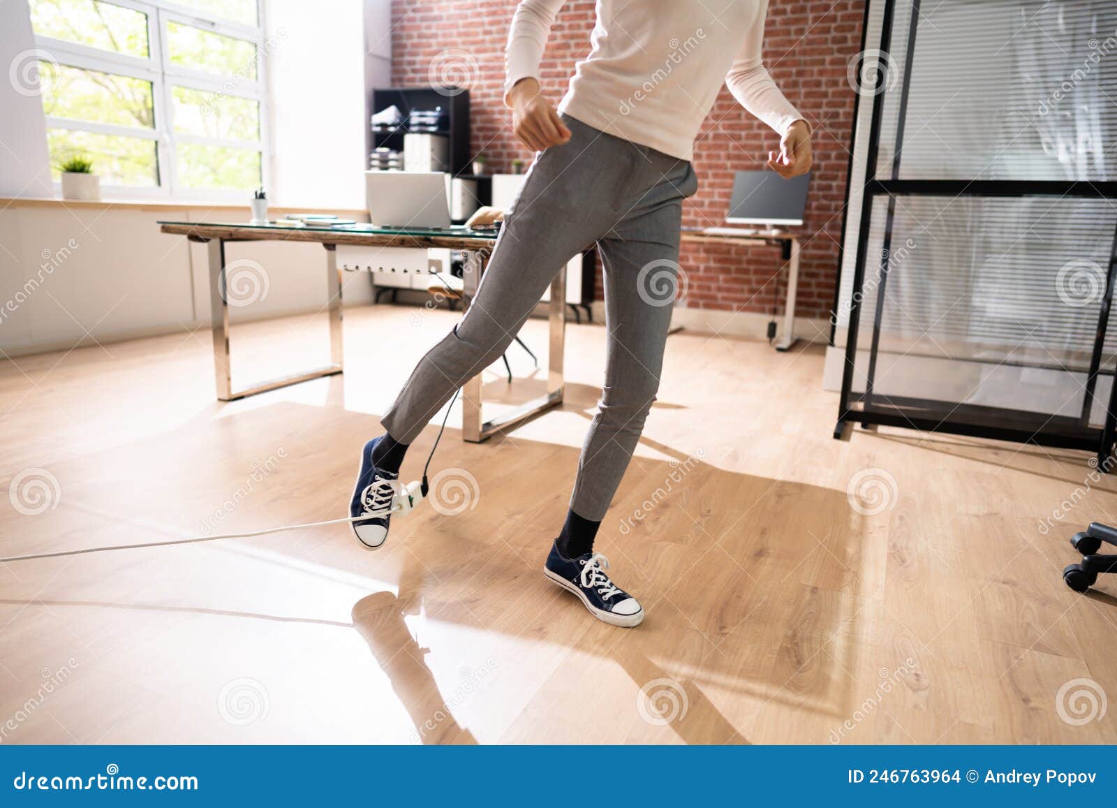 Stumble and Fall Over Wire stock photo. Image of electric - 246763964