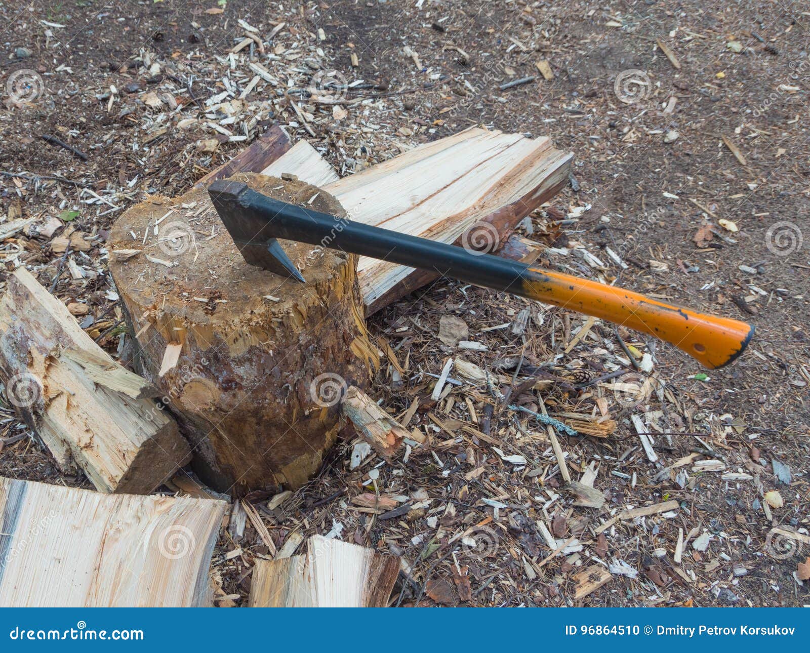 In the Stump Stuck a Hatchet for Splitting Firewood. Stock Photo ...