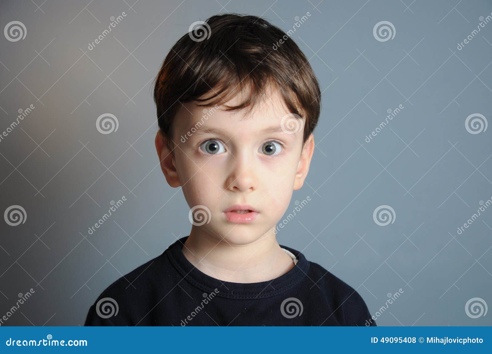 Stunned boy stock photo. Image of serious, head, green - 49095408