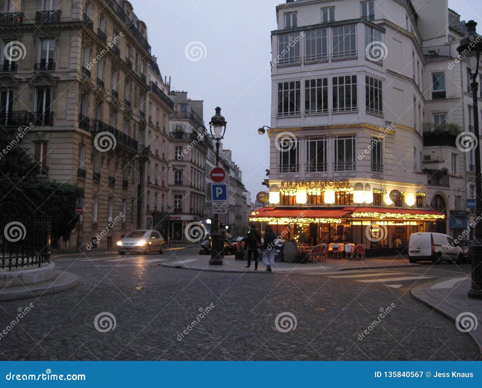 A Stunning Corner Restaurant on an Evening in Paris Editorial ...