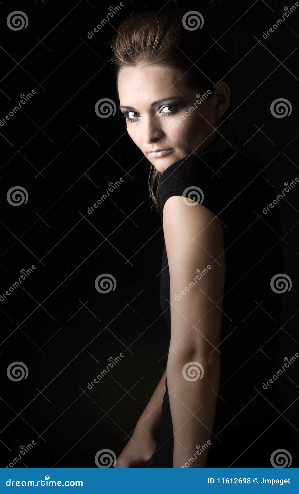Stunning Fashion Model Against Dark Background Stock Photo - Image of ...