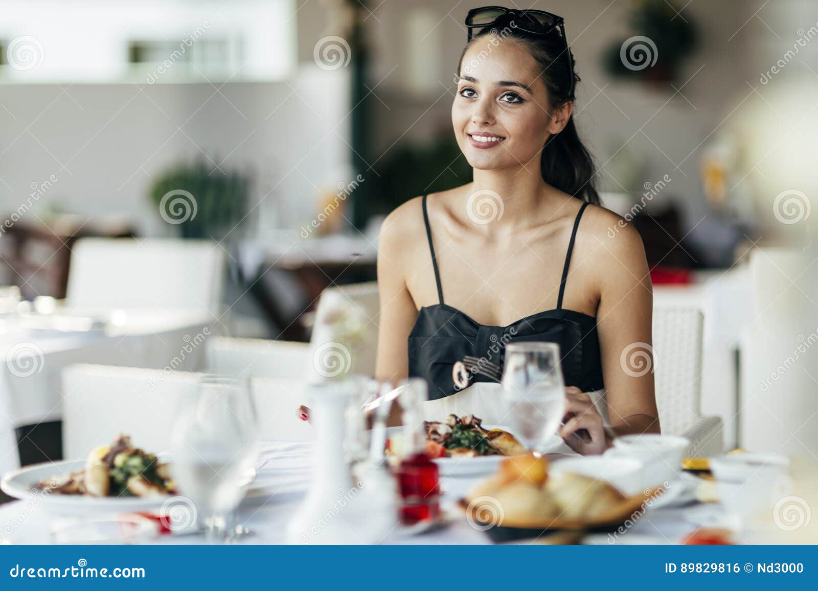 Stunning lady having lunch stock photo. Image of girl - 89829816