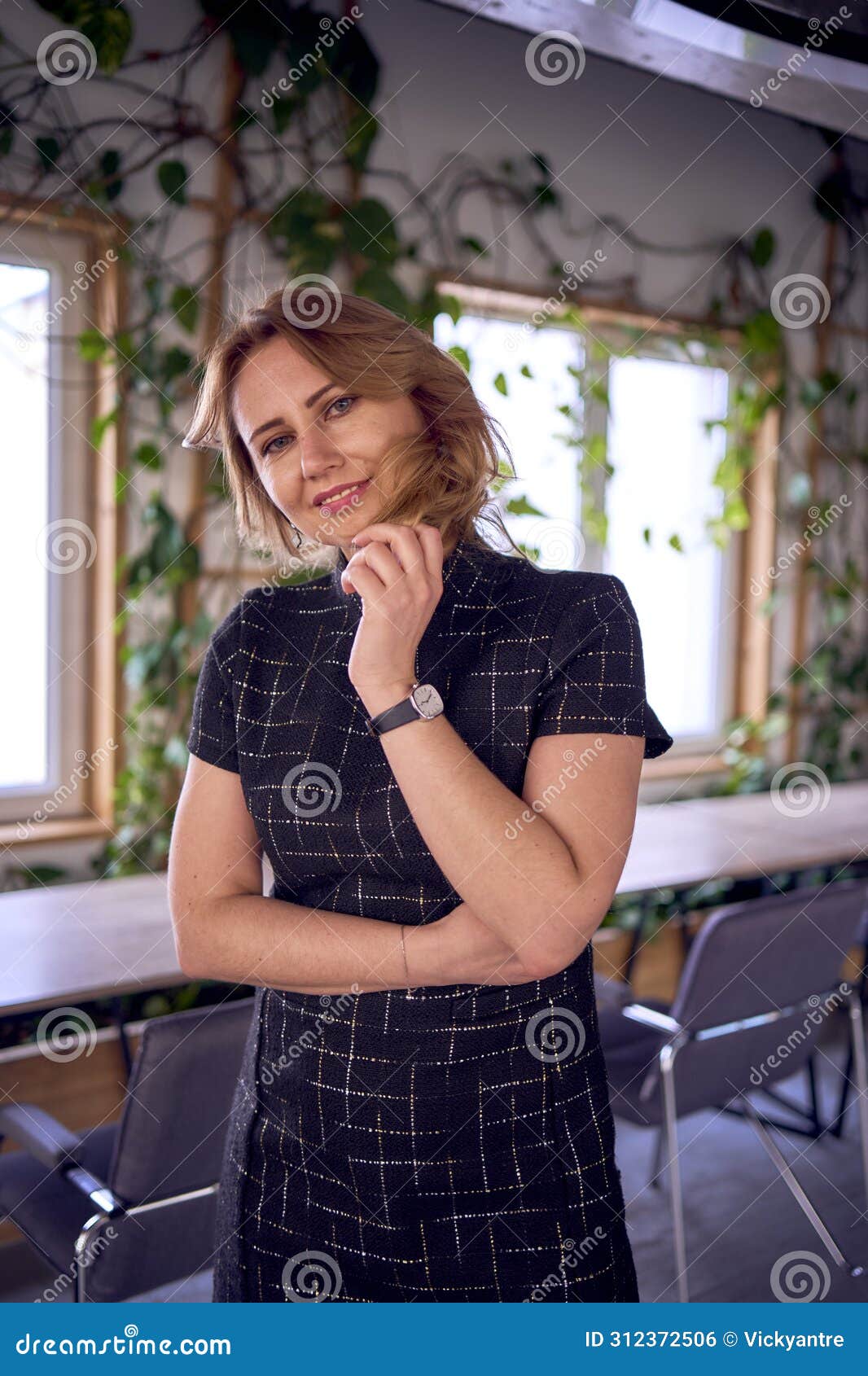 Stunning Model in Business Mini Dress Posing in Modern Office Space ...