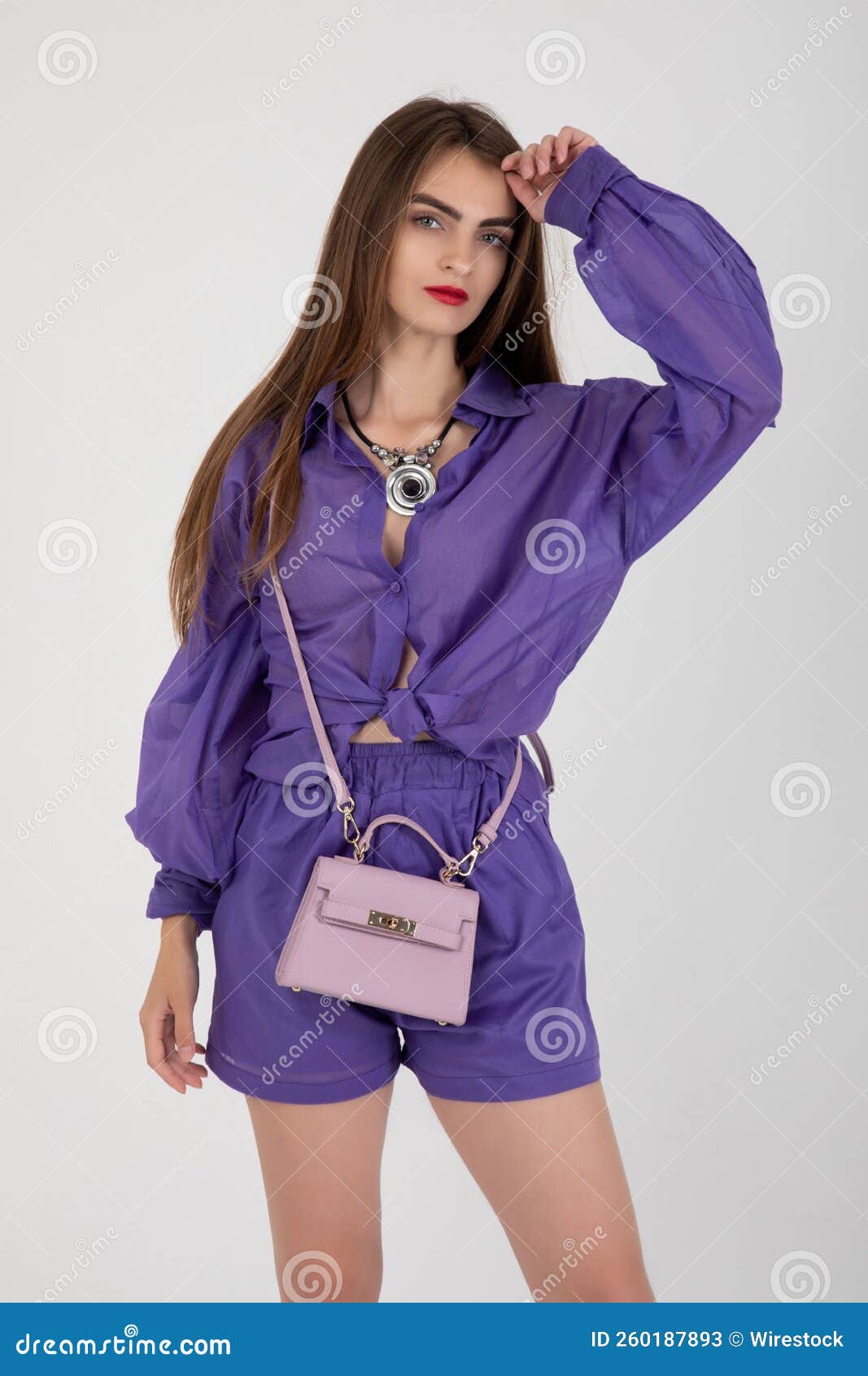 Stunning Model Posing in a Purple Short Set Stock Image - Image of hair ...