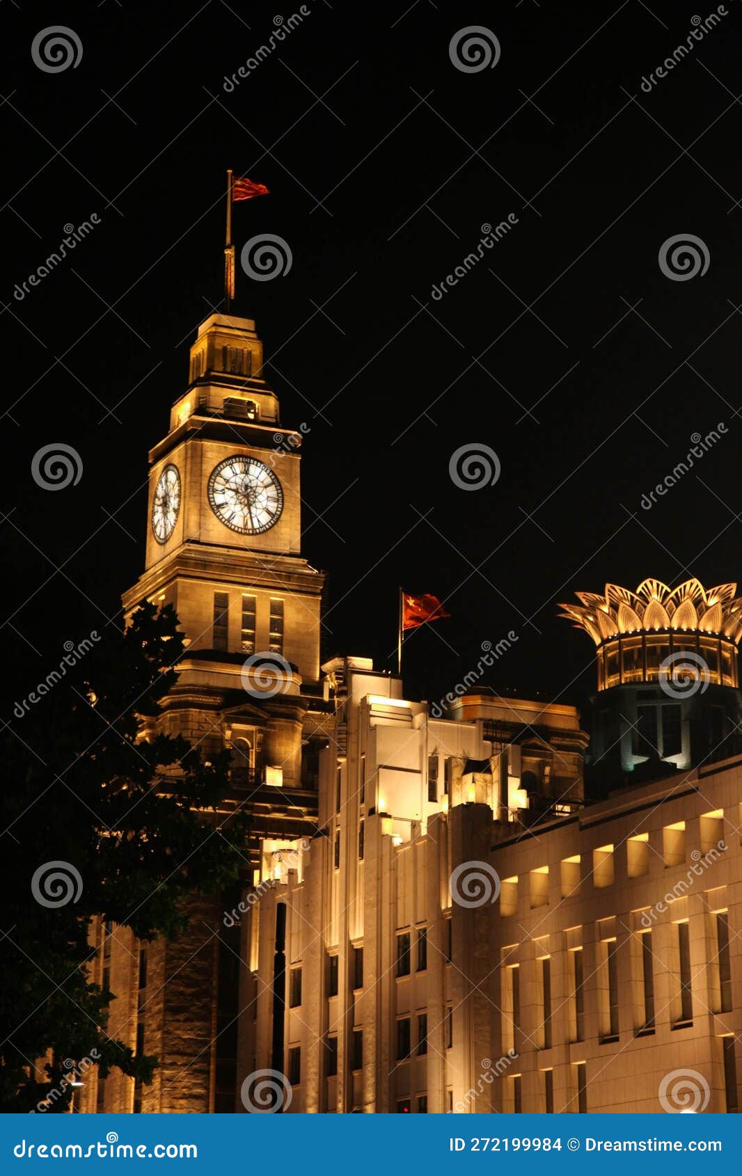 Stunning Night View of a Large Building with a Clock Tower Illuminated ...