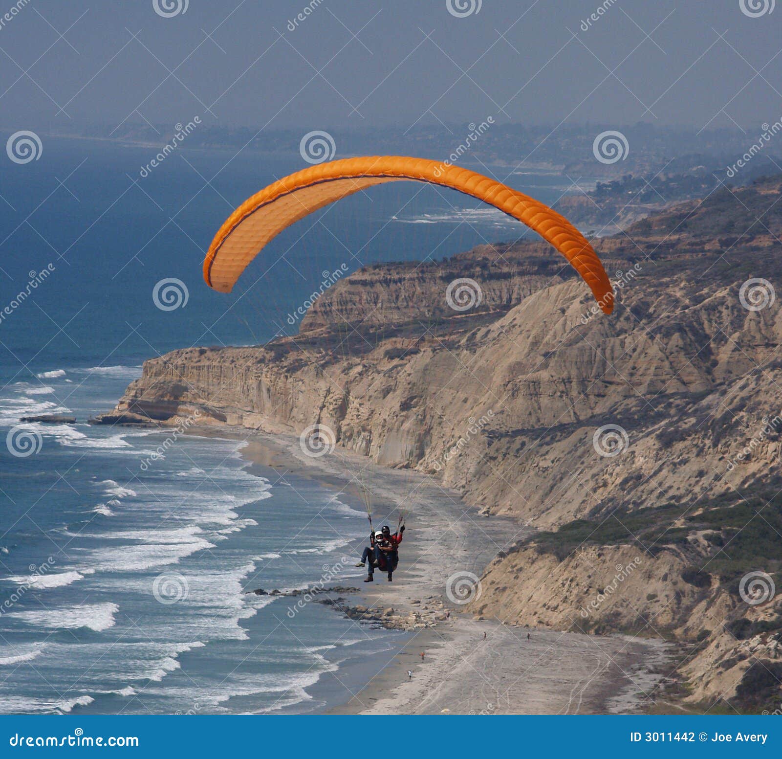 STUNNING paragliding shot! stock photo. Image of kite - 3011442