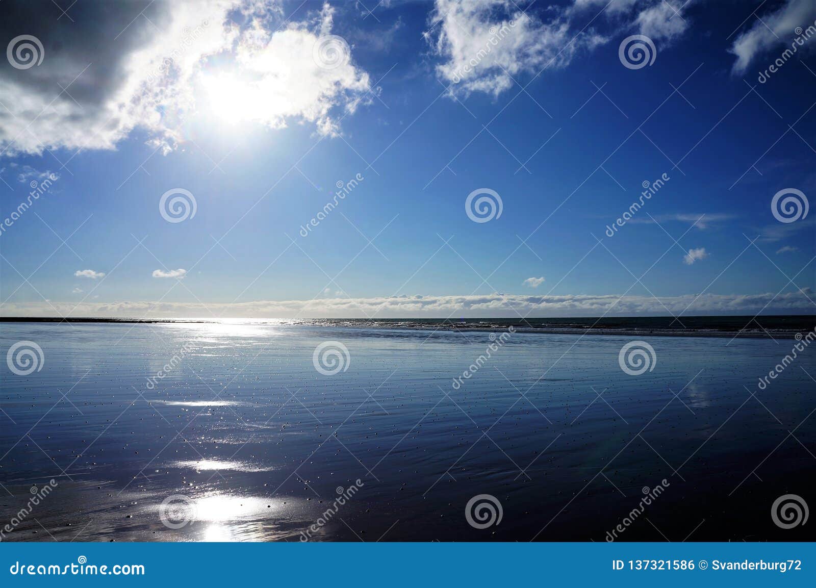 Stunning Reflection of Sunlight at the Beach in Normandy Stock Photo ...