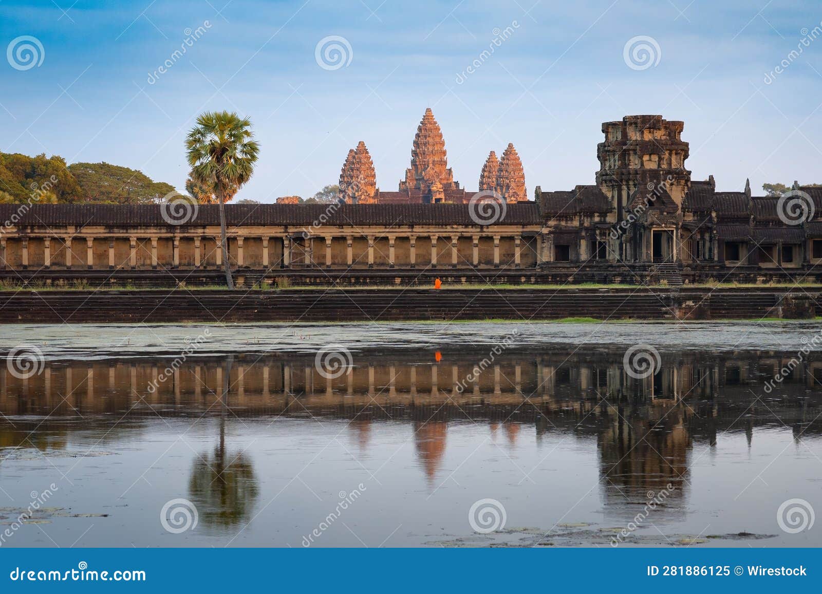 Stunning Shot of the Iconic Angkor Wat Temple Reflected in a Tranquil ...